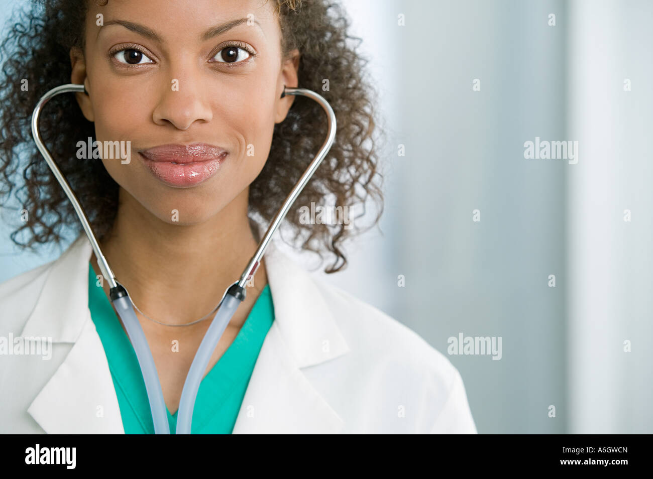 Doctor wearing stethoscope Stock Photo - Alamy