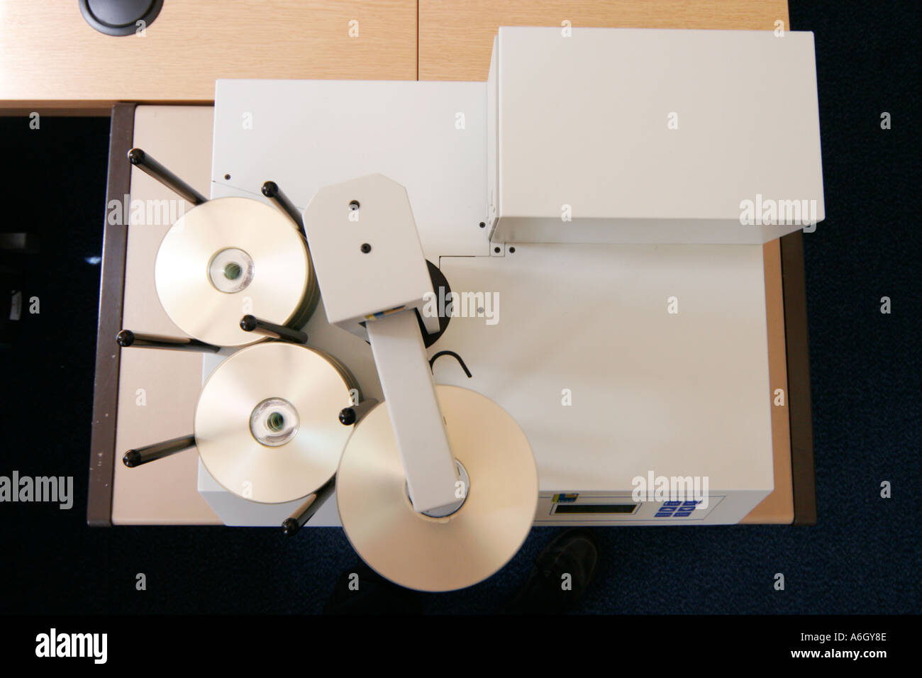 Automatic CD DVD recorder duplicator in Office environment desk Stock ...