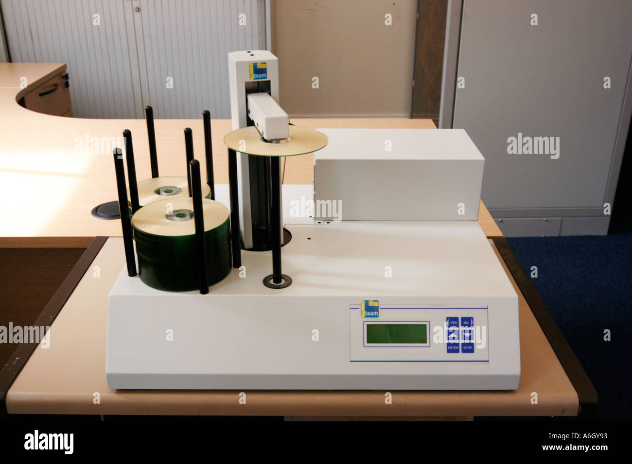 Automatic CD DVD recorder duplicator in Office environment desk Stock ...
