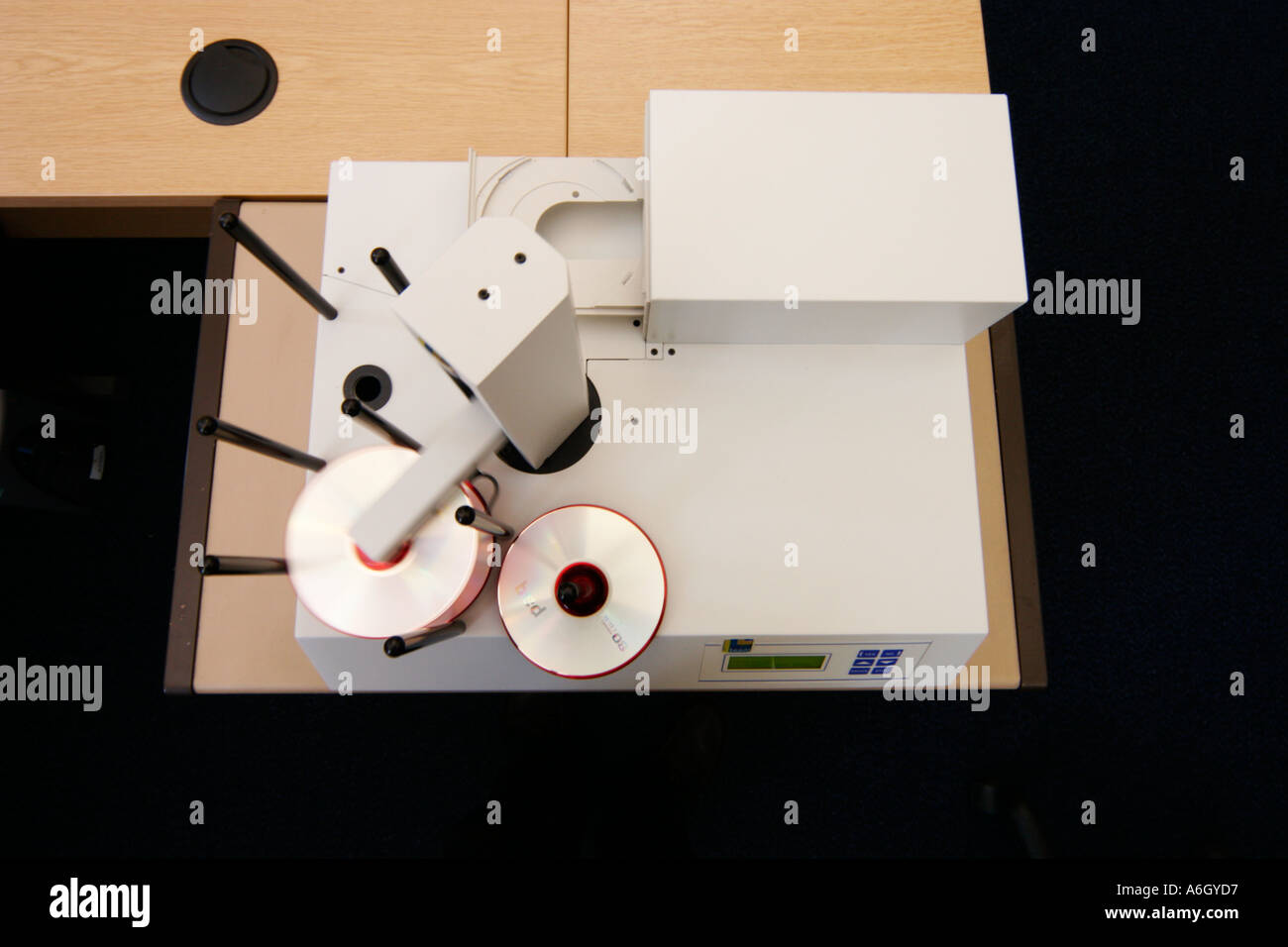 Automatic CD DVD recorder duplicator in Office environment desk Stock ...