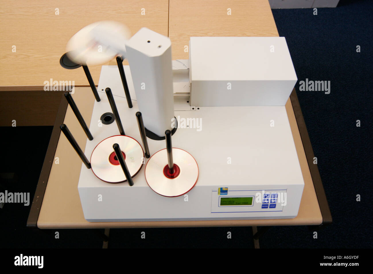 Automatic CD DVD recorder duplicator in Office environment desk Stock ...