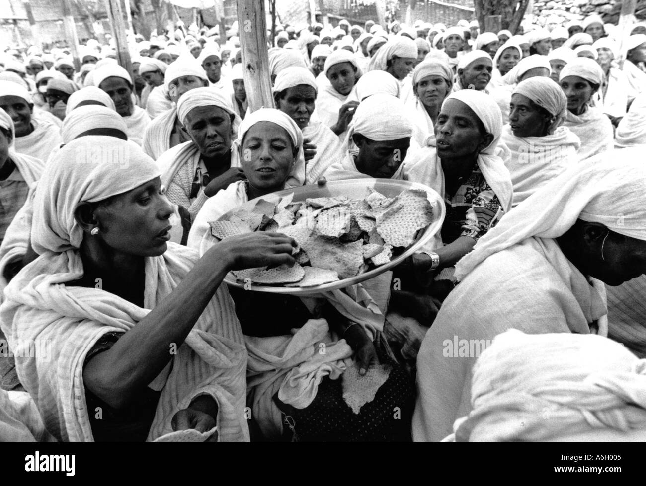 distribution of matsa bread amongst women during Passover celebrations ...