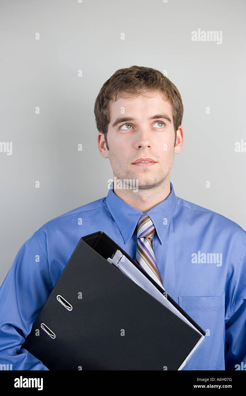 Office worker with a folder Stock Photo - Alamy