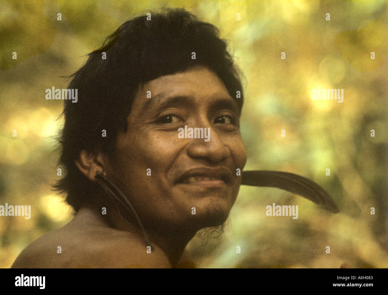 Portrait of E´ñepa (Panare) man with feather ear ornaments in i5he ...