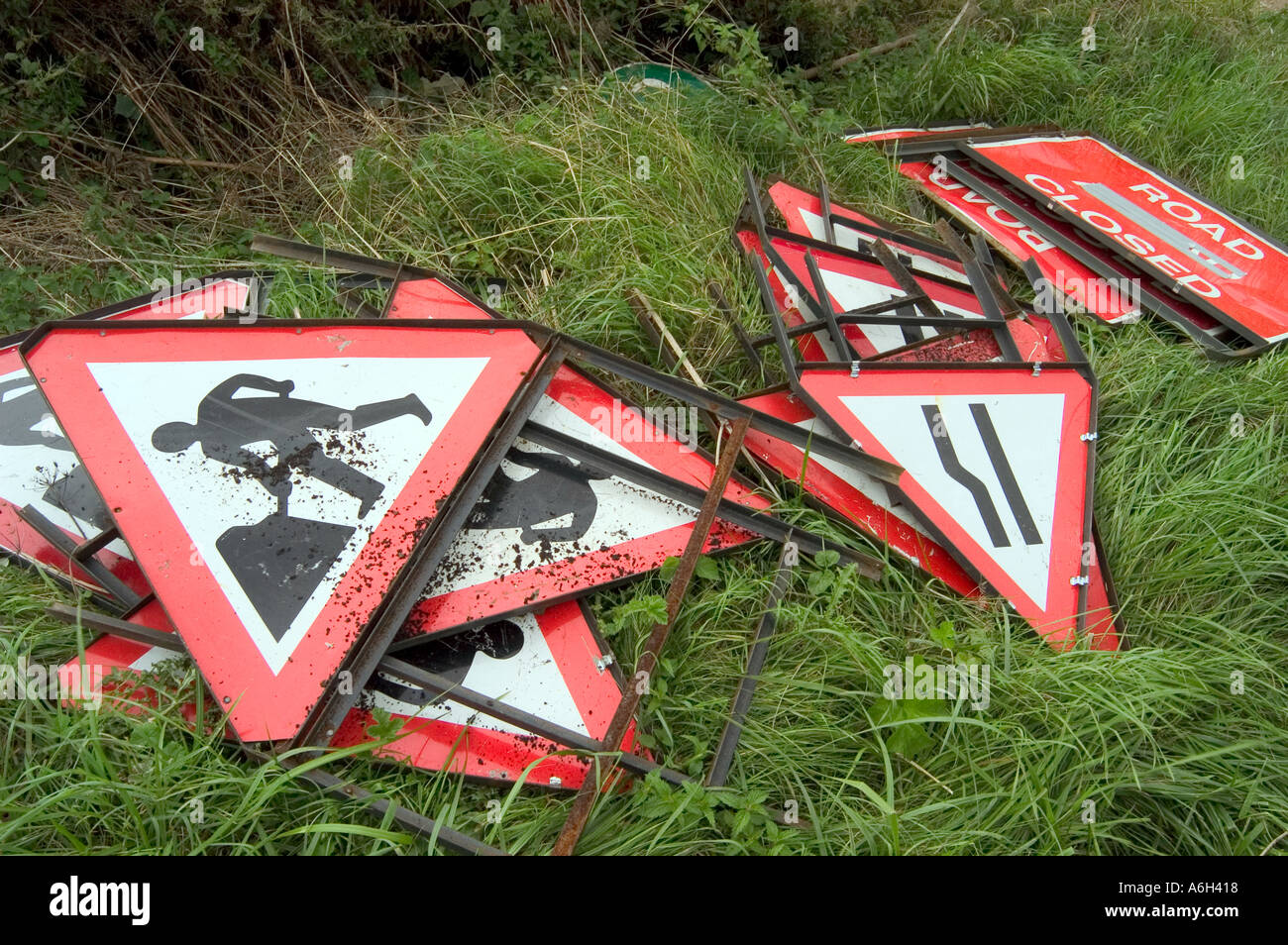 Road work and direction signs on the side of the road Stock Photo - Alamy