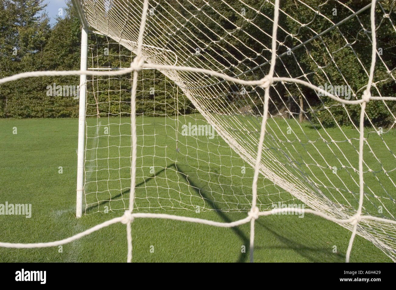 Netting of an empty goal mouth Stock Photo - Alamy