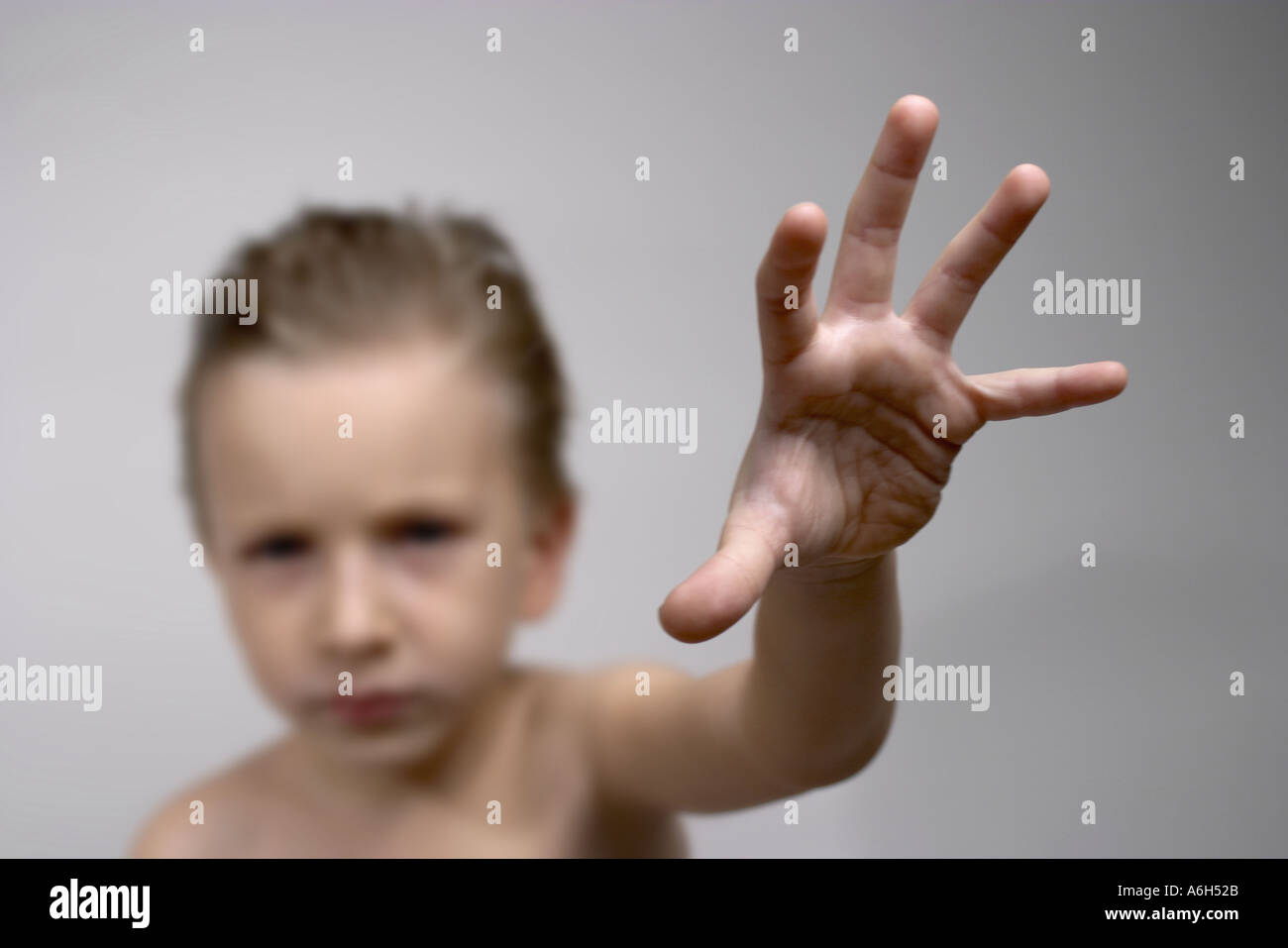 Friendly kid poses Stock Photo - Alamy