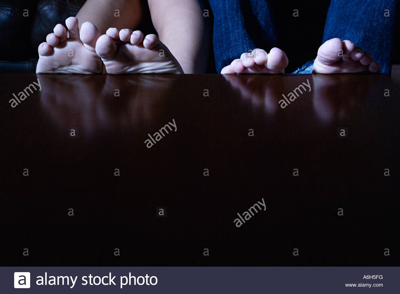 Feet On Table Stock Photos & Feet On Table Stock Images - Alamy