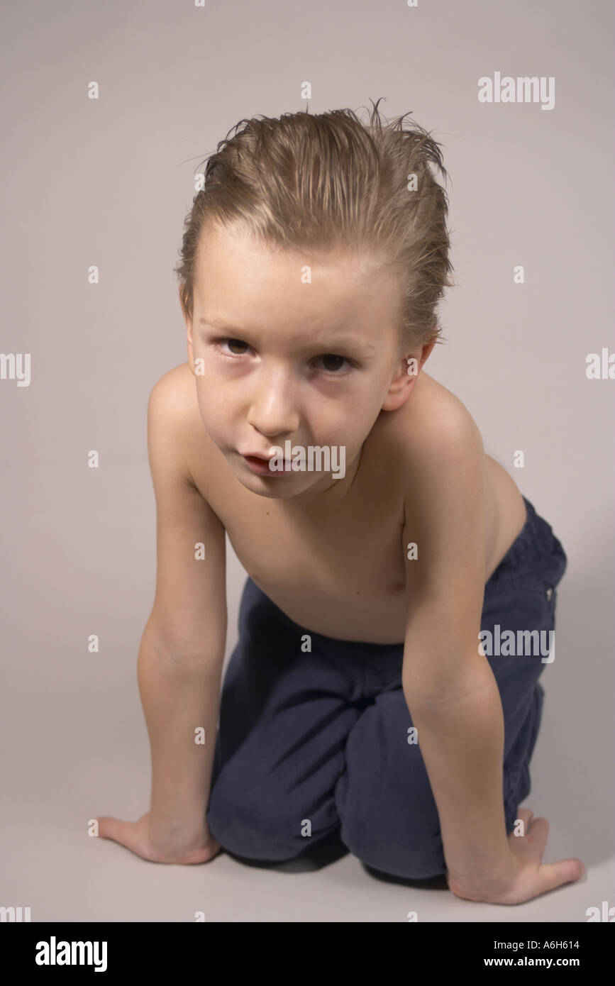 Friendly kid poses Stock Photo - Alamy