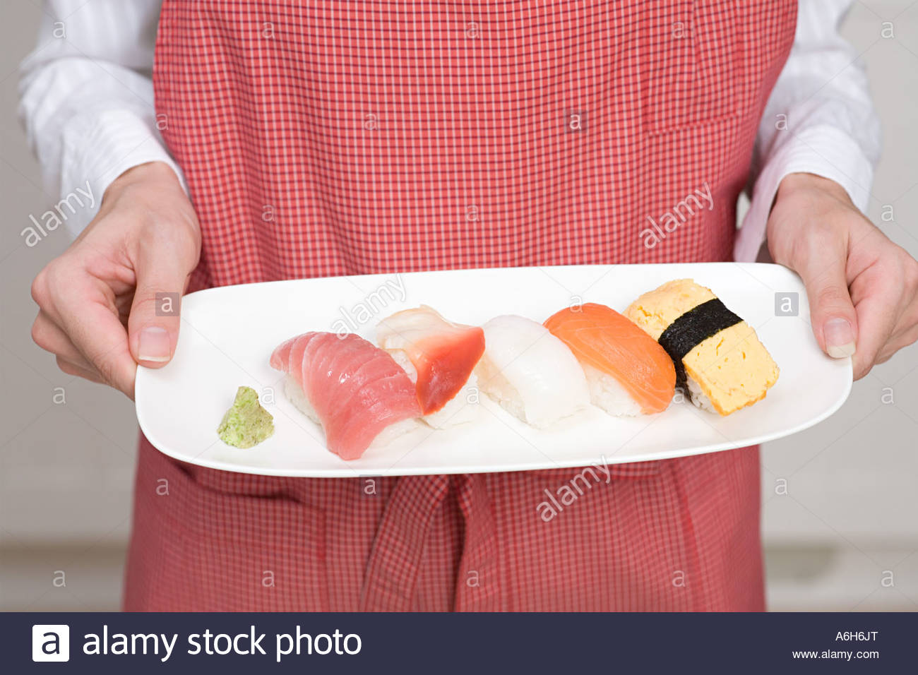 Japanese Person Eating Sushi Stock Photos & Japanese Person Eating ...