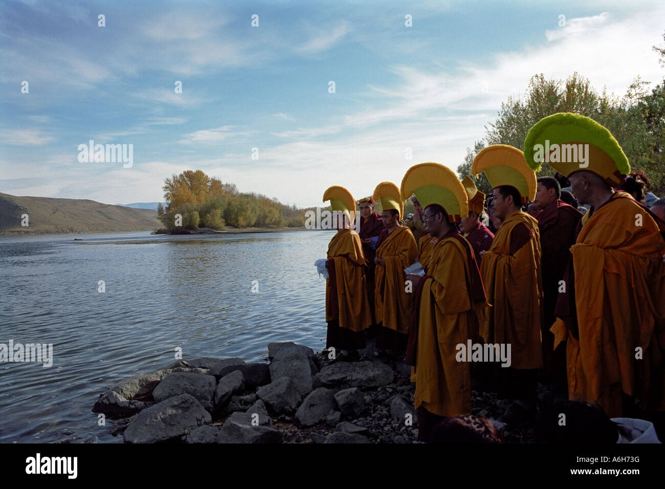Monks are singing mantras before pouring sand from destroying Mandala ...