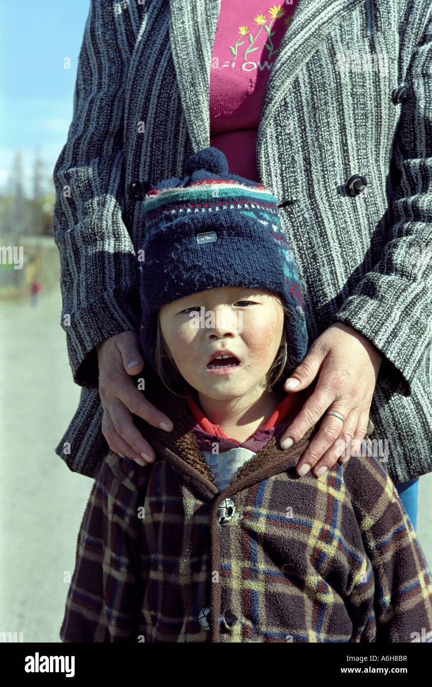 Portrait of a small girl with mother. Toora-Khem village. The Tyva ...