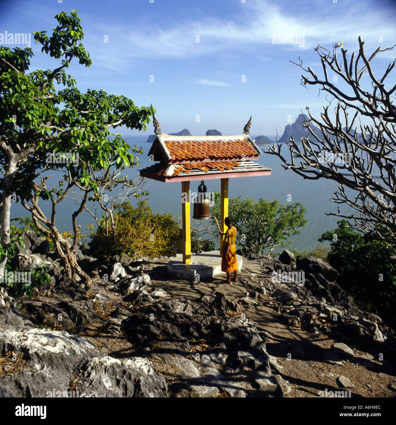 Man ringing temple bell hi-res stock photography and images - Alamy
