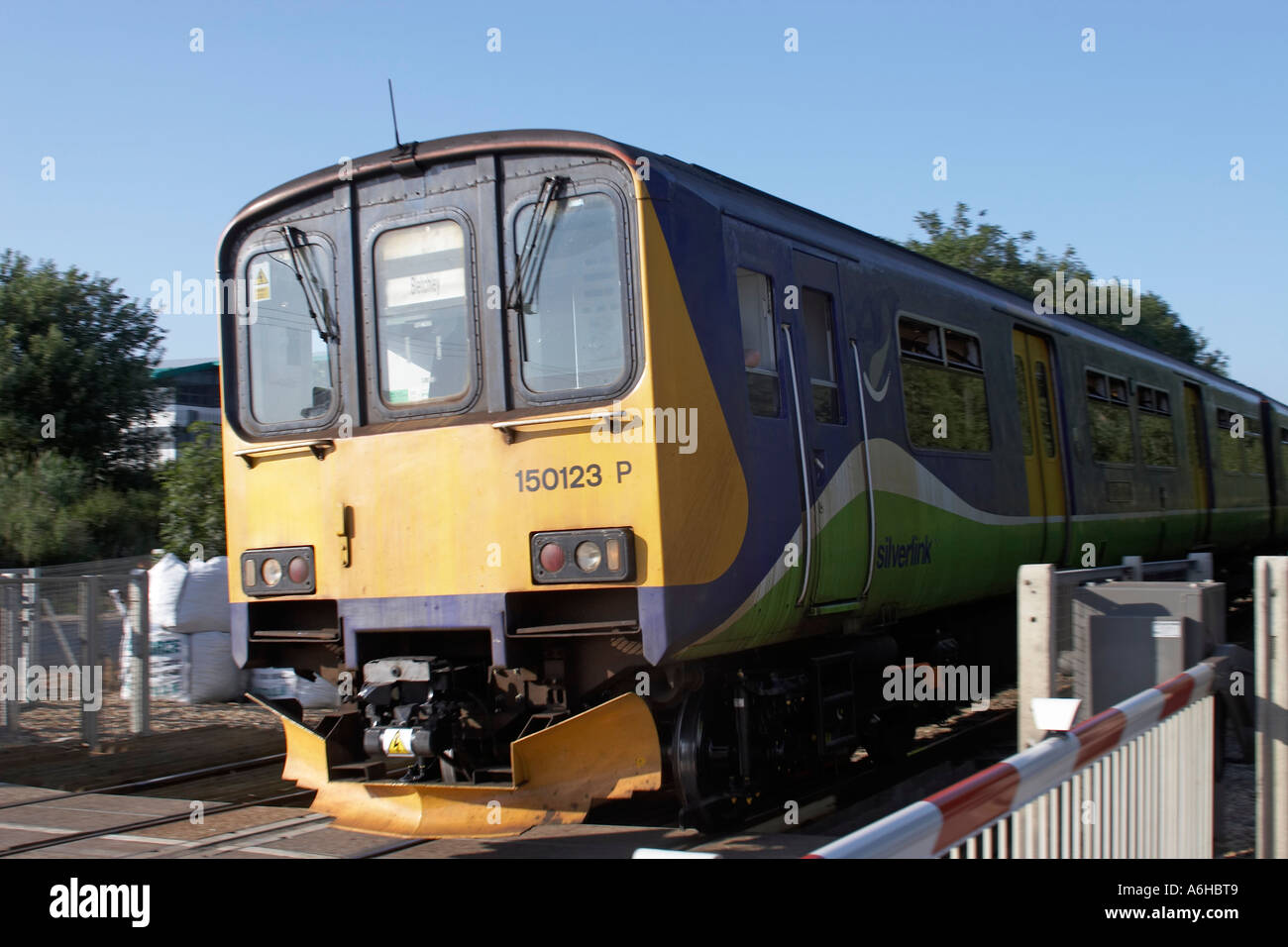 Silverlink train going through level crossing Bedfordshire England UK ...