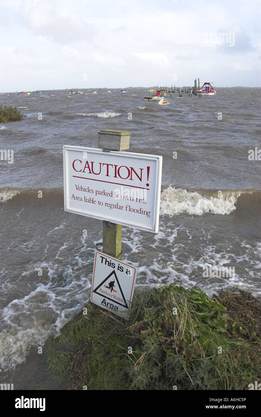 Spring high tide at Morston Harbour showing blakeney point ferry boat ...