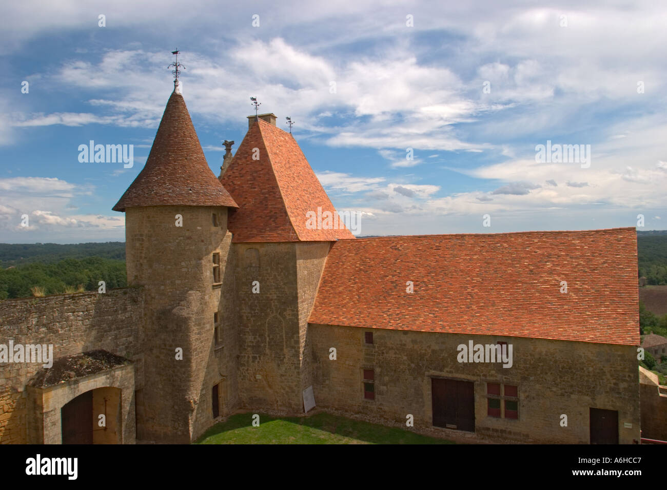 Elevated view of french Chateau with steep roof and red roof tiles and ...