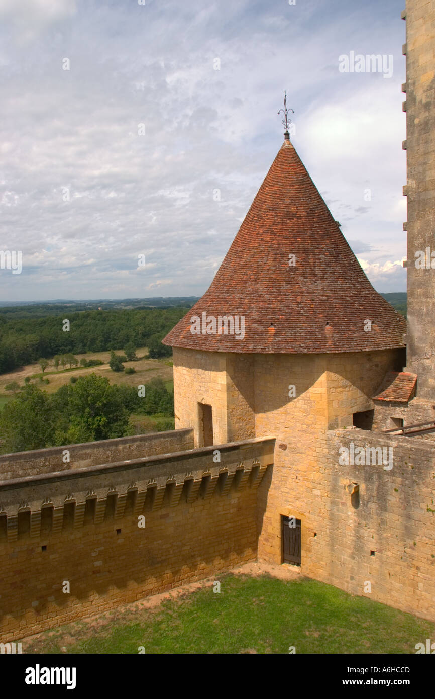 Turret with red roof tiles and wall on french medieval Chateau ...