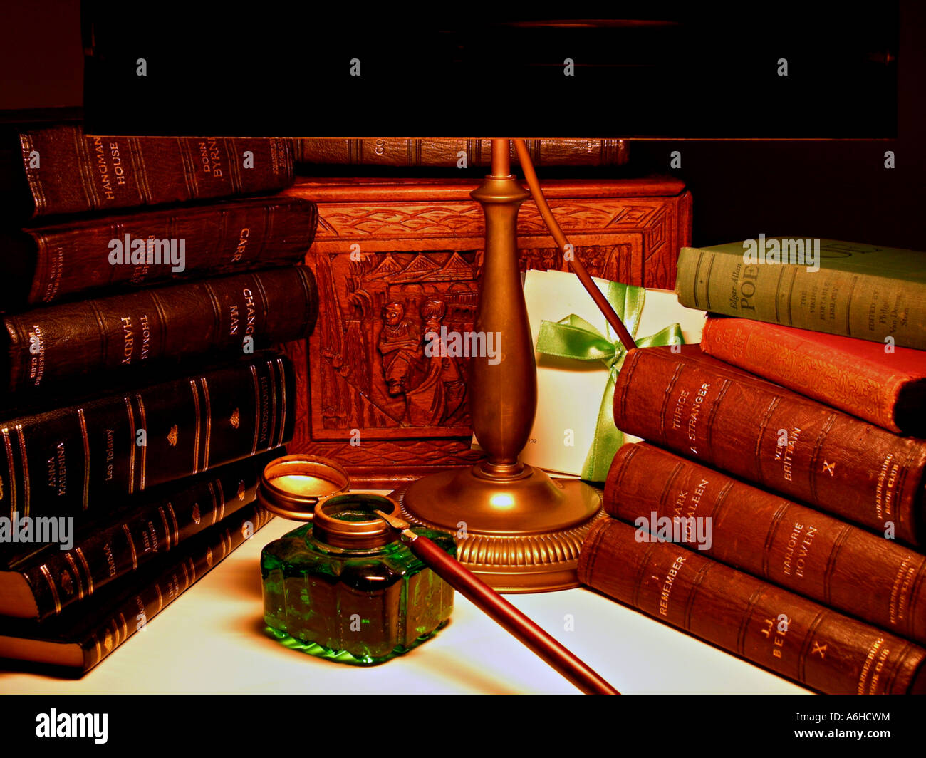 Old writing desk with books and writing equipment Stock Photo - Alamy