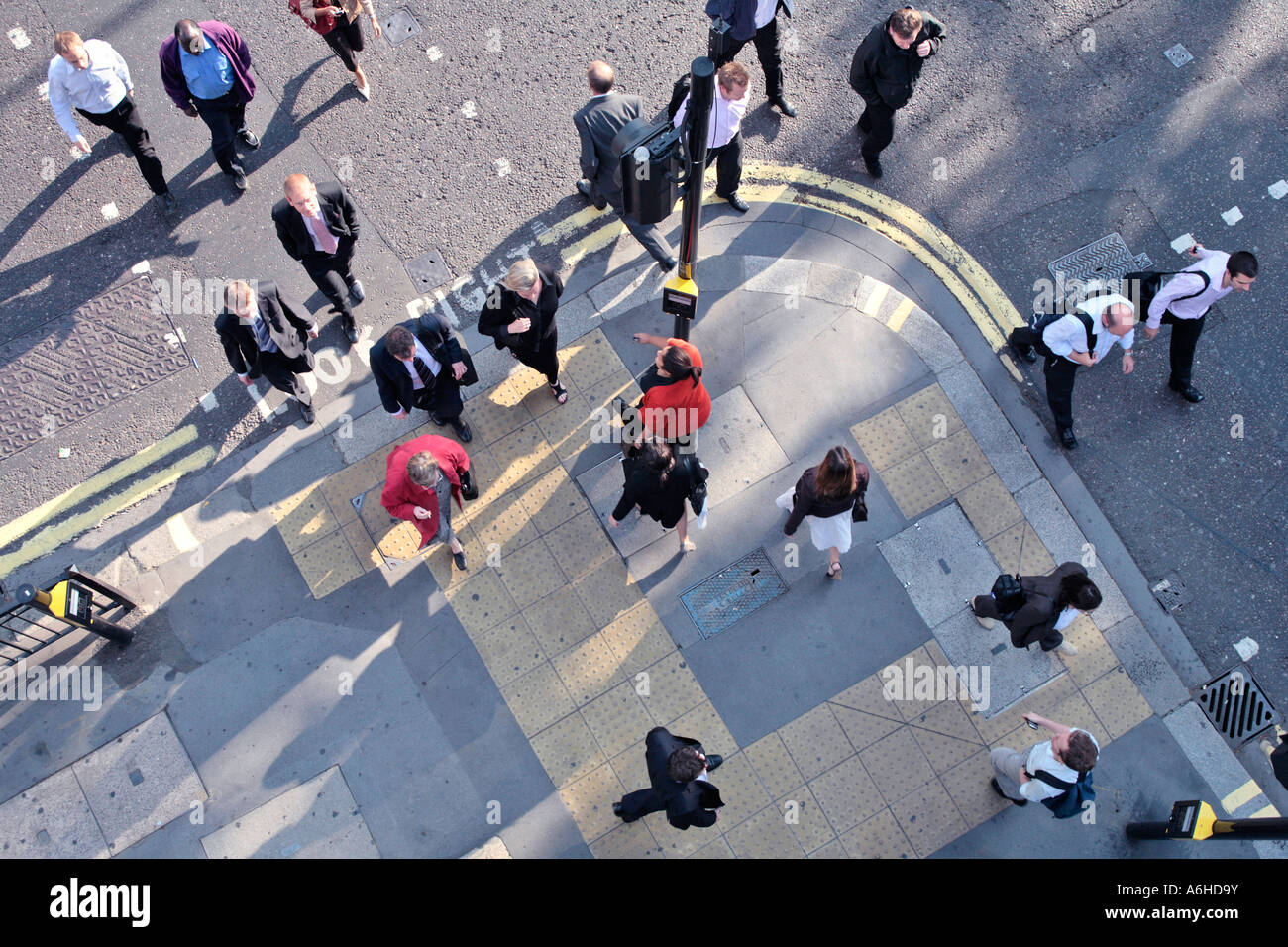 A crowd of people at a London street corner as seen from above Stock ...