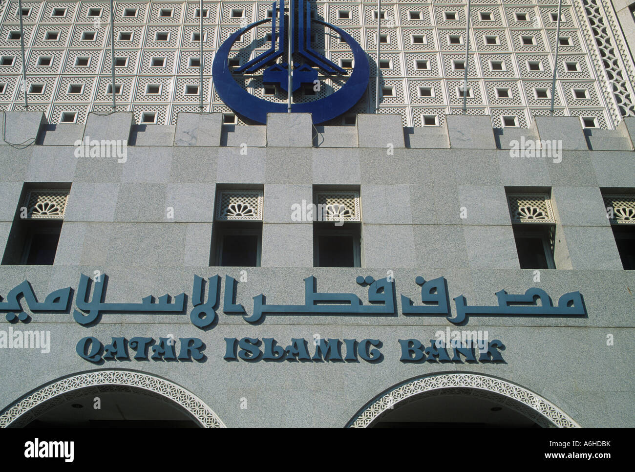 Facade of the Qatar Islamic Bank in Doha, established 1982 Stock Photo ...