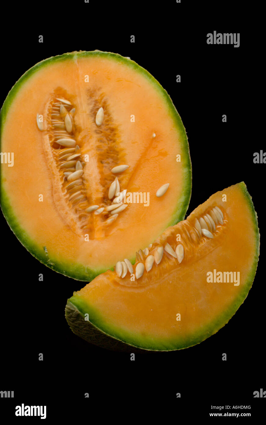 Melon cut in half hi-res stock photography and images - Alamy