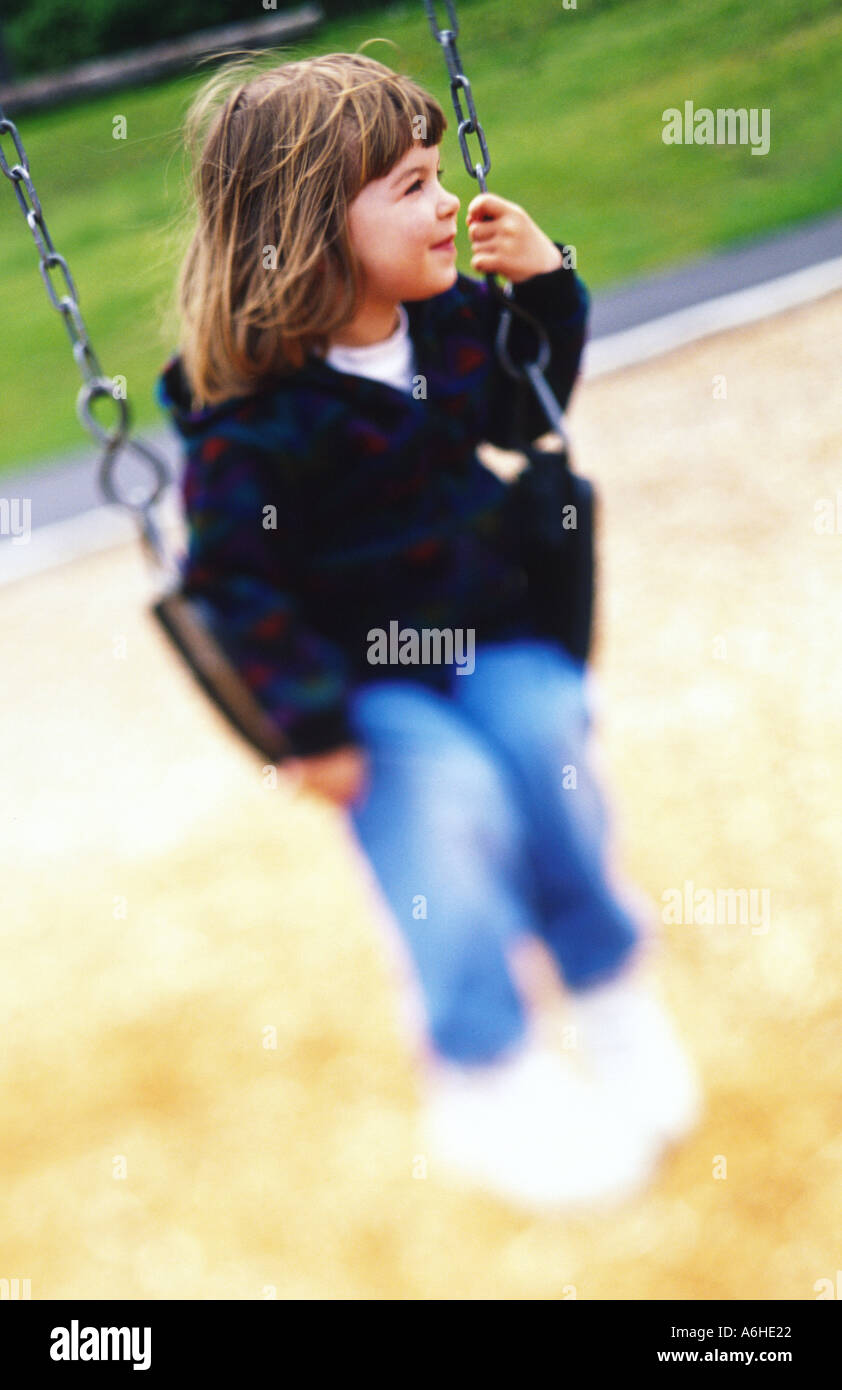 Young Girl on Swing Stock Photo - Alamy