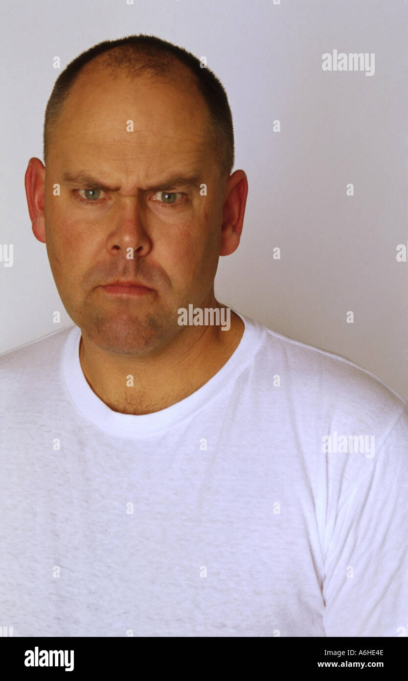 Angry Bold Man Stock Photo - Alamy