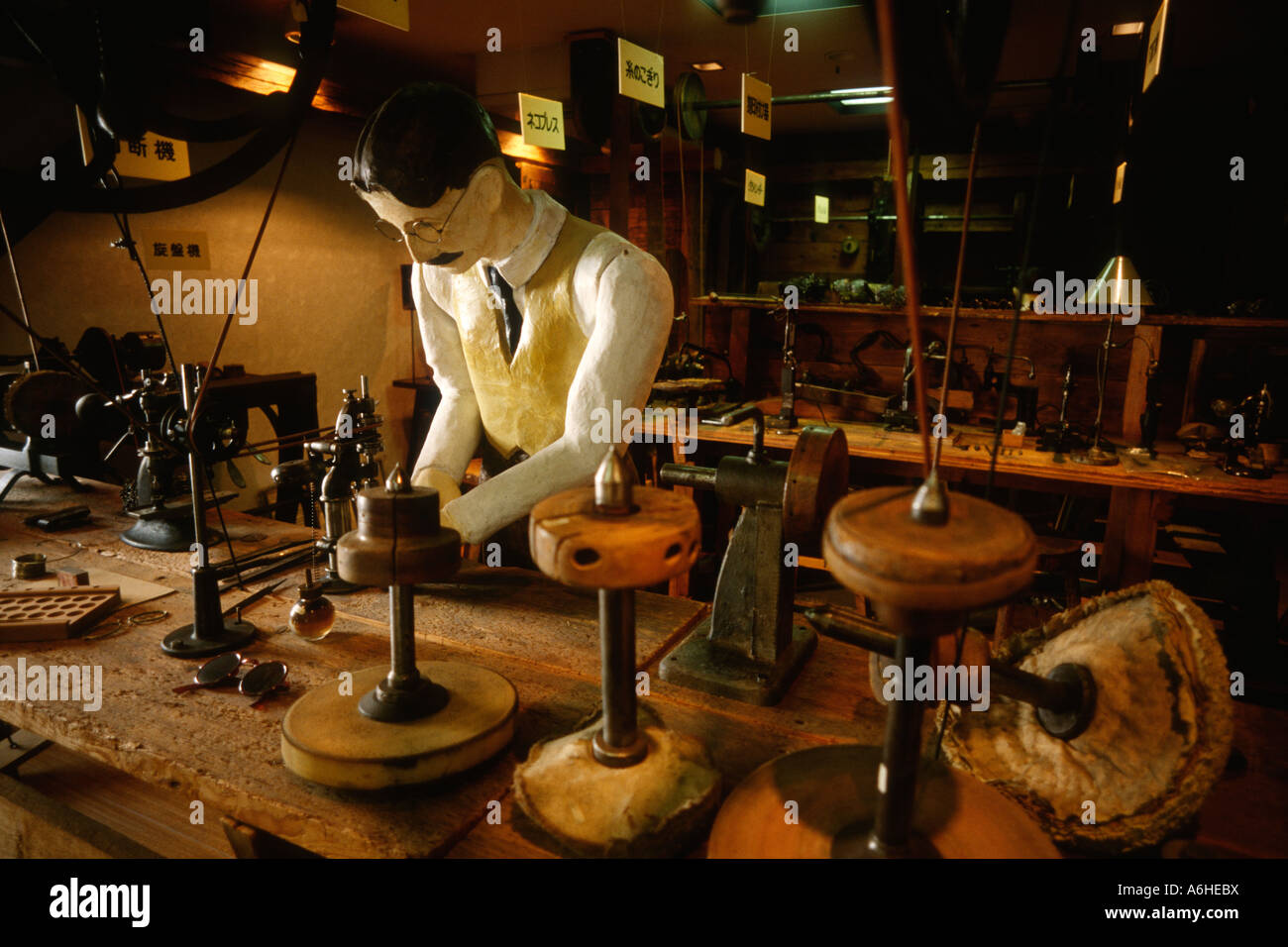 Tokyo Japan Exhibit showing man polishing glass lenses in the Eyeglass ...