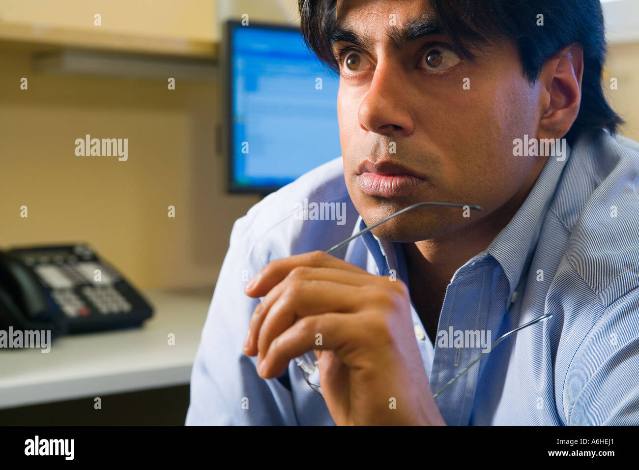 east indian male executive in office cubicle Stock Photo - Alamy