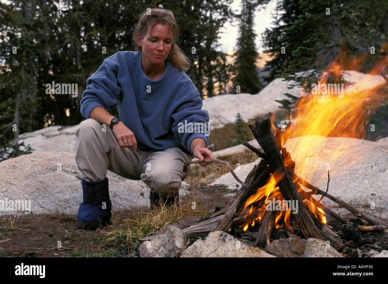 Poking the fire hi-res stock photography and images - Alamy