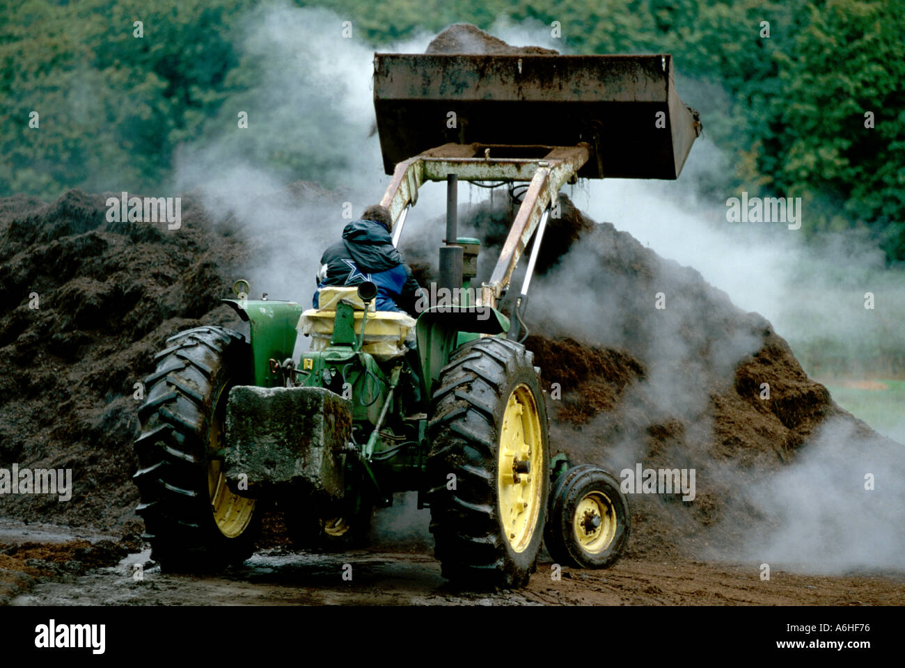 Loader Shoveling Dirt Stock Photo - Alamy