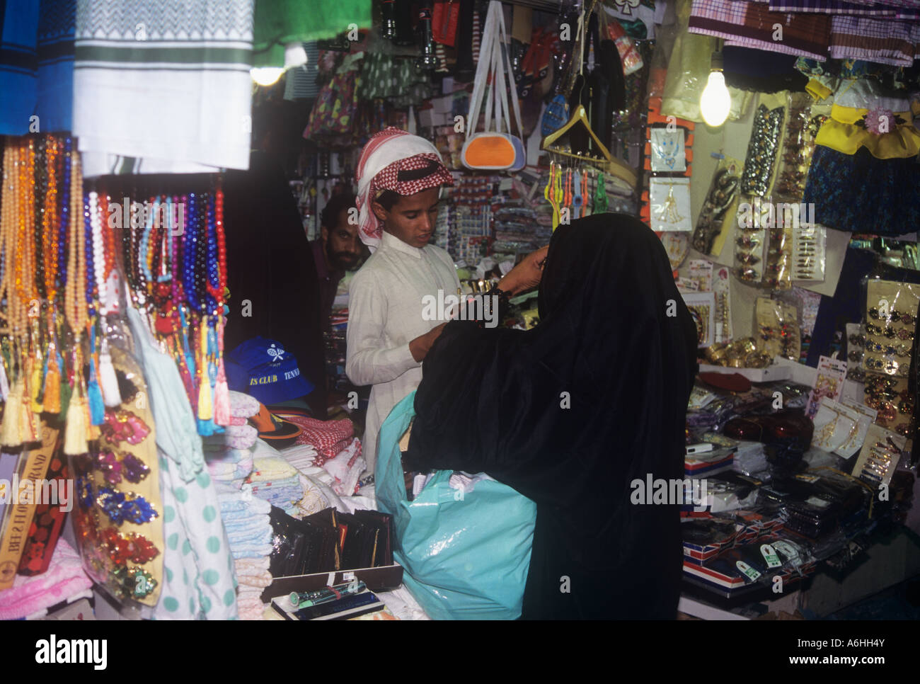 A woman shopping for eid presents in Doha souq, Qatar, 1995 Stock Photo ...