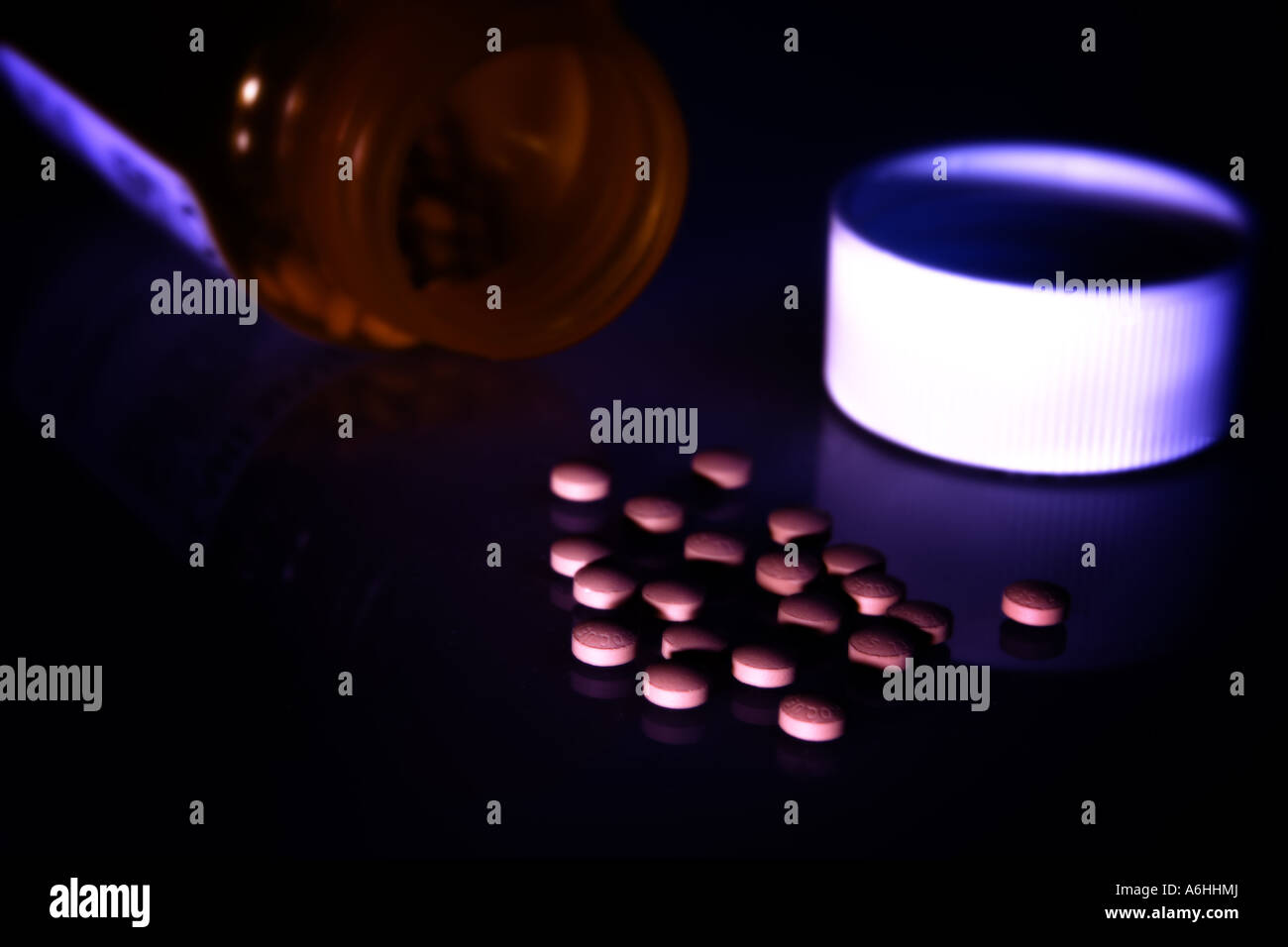 Drugs on dark table Blue high contrast effect Stock Photo - Alamy
