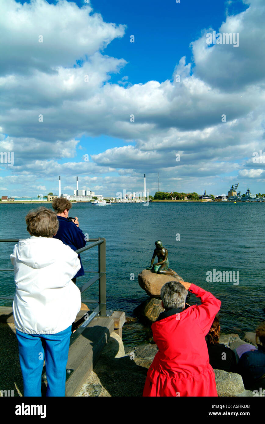Tourists photographing The Little Mermaid sculpture.Edvard Eriksen (1913).Copenhagen.Denmark ...
