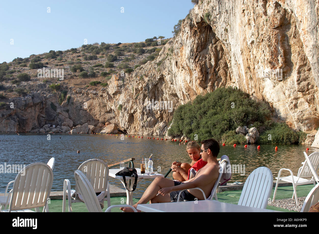 Couple resting sunbathing lake sand hi-res stock photography and images ...
