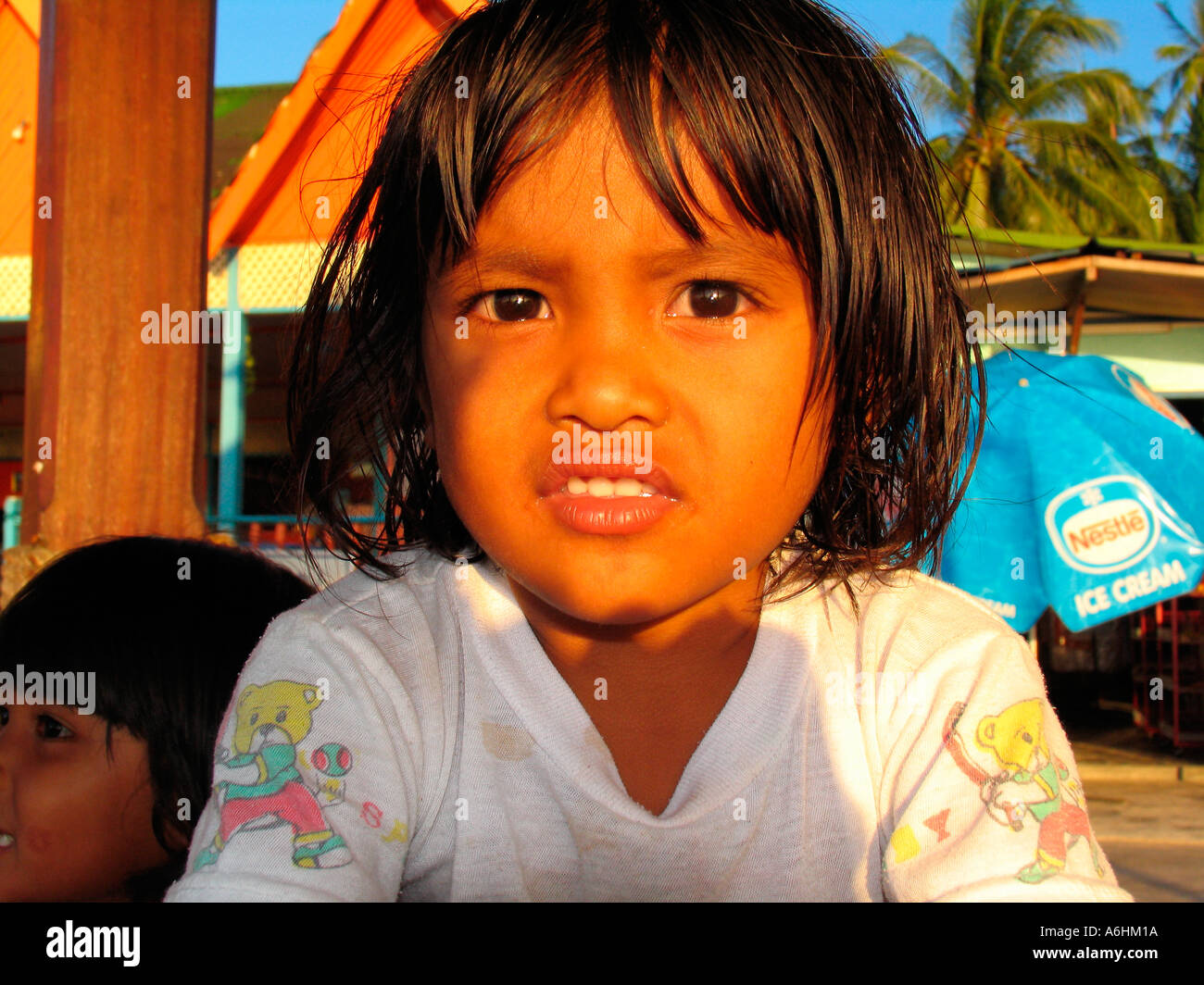 Young girl beside jetty Salang Beach Tioman Island Malaysia Stock Photo ...