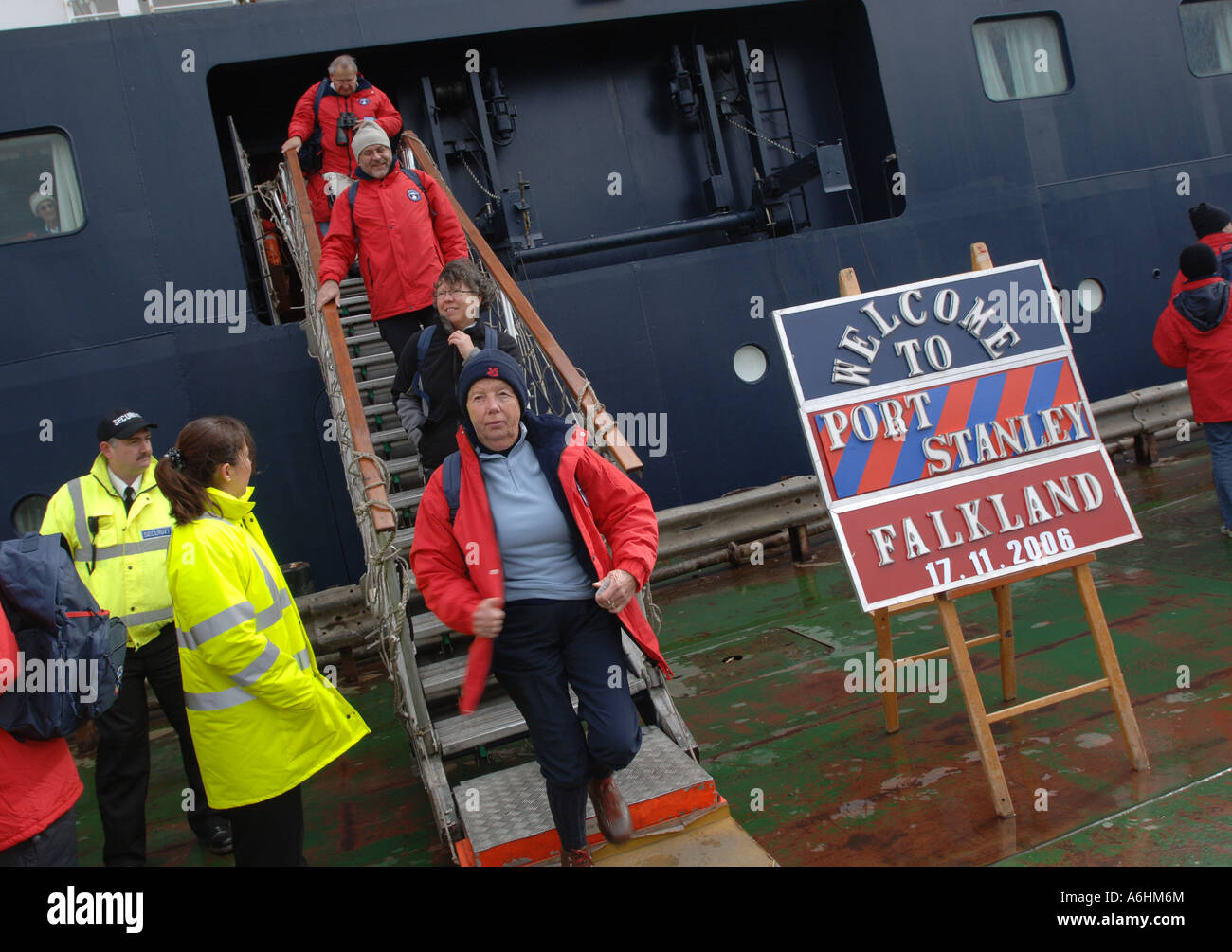 Passengers disembarking from a cruise ship in Stanley Harbour, Falkland ...
