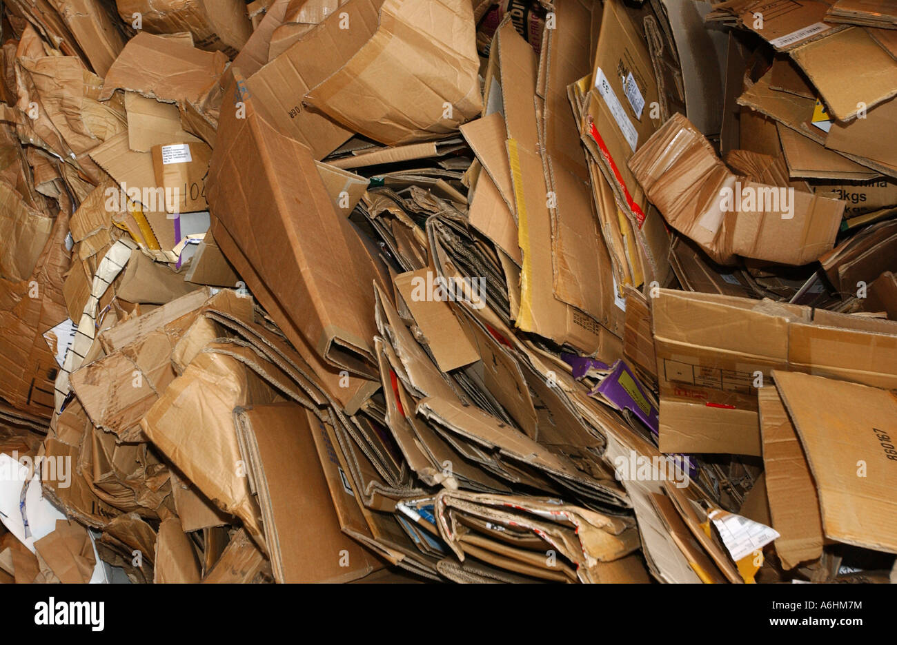 Piles of cardboard waiting to be recycled Stock Photo - Alamy