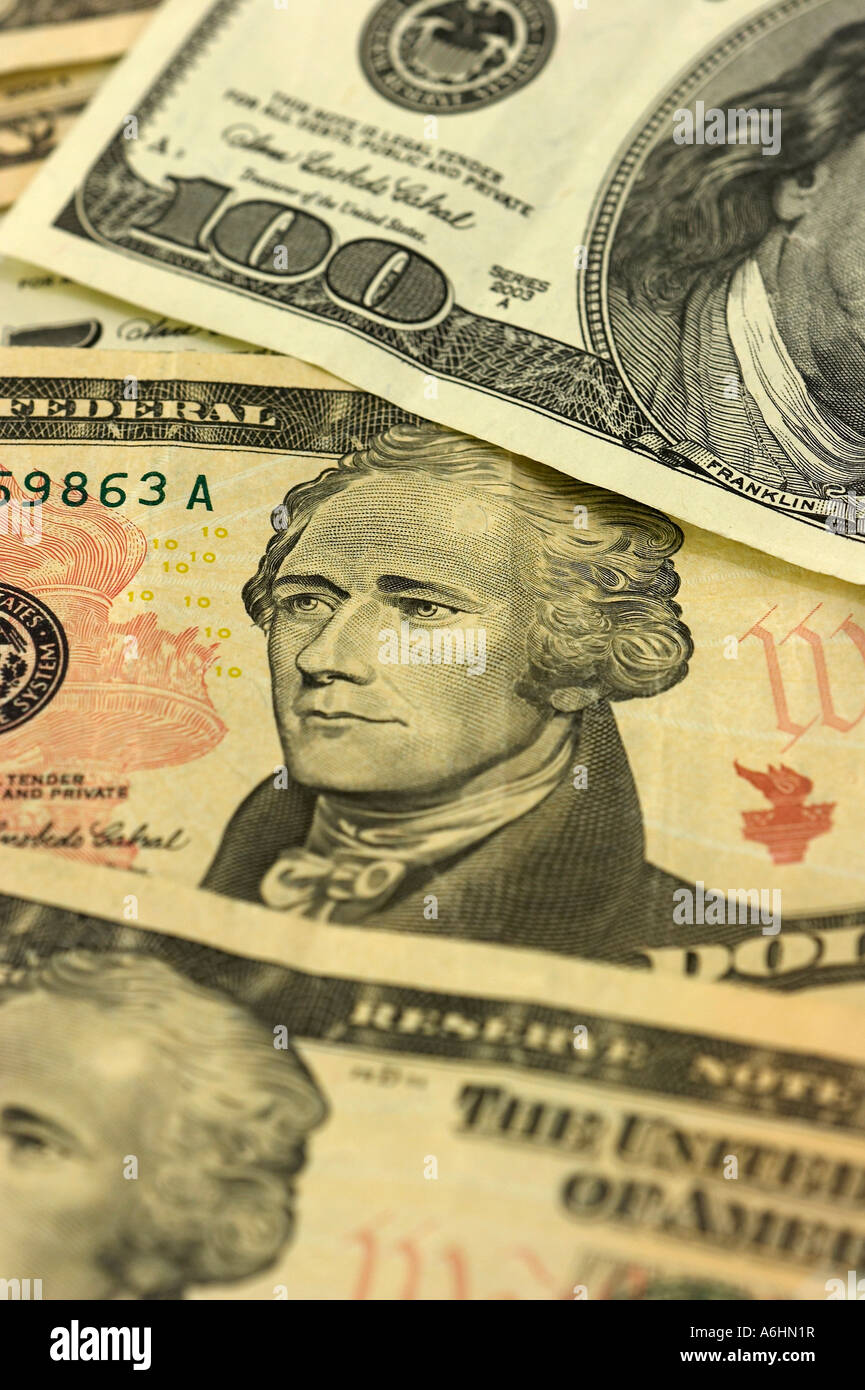 United States dollar bills up close featuring ten dollar bills and one ...