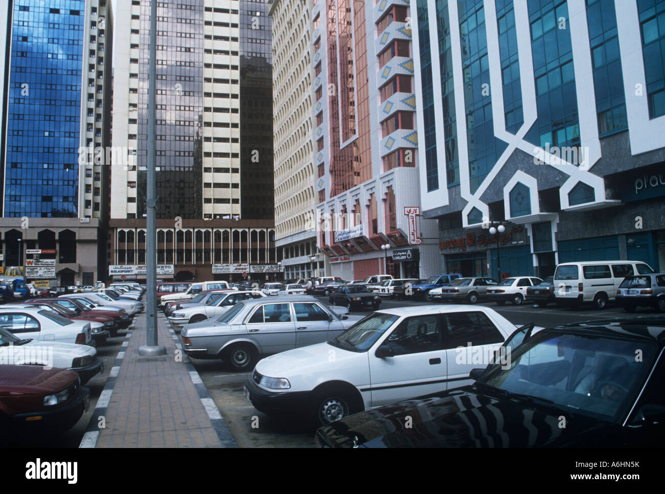 Scene in the commercial centre of Anu Dhabi with angle parking and ...