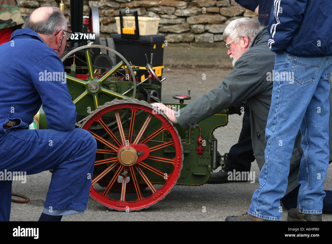 Men with scale model steam powered working traction engine Stock Photo ...