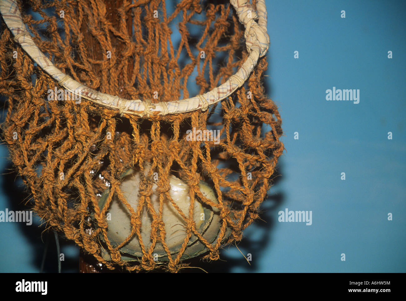 A pearl diver`s basket in which he puts the pearl-shells plucked off ...
