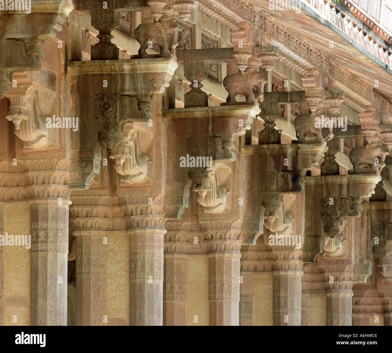 Row of ornate carved columns in India Stock Photo - Alamy
