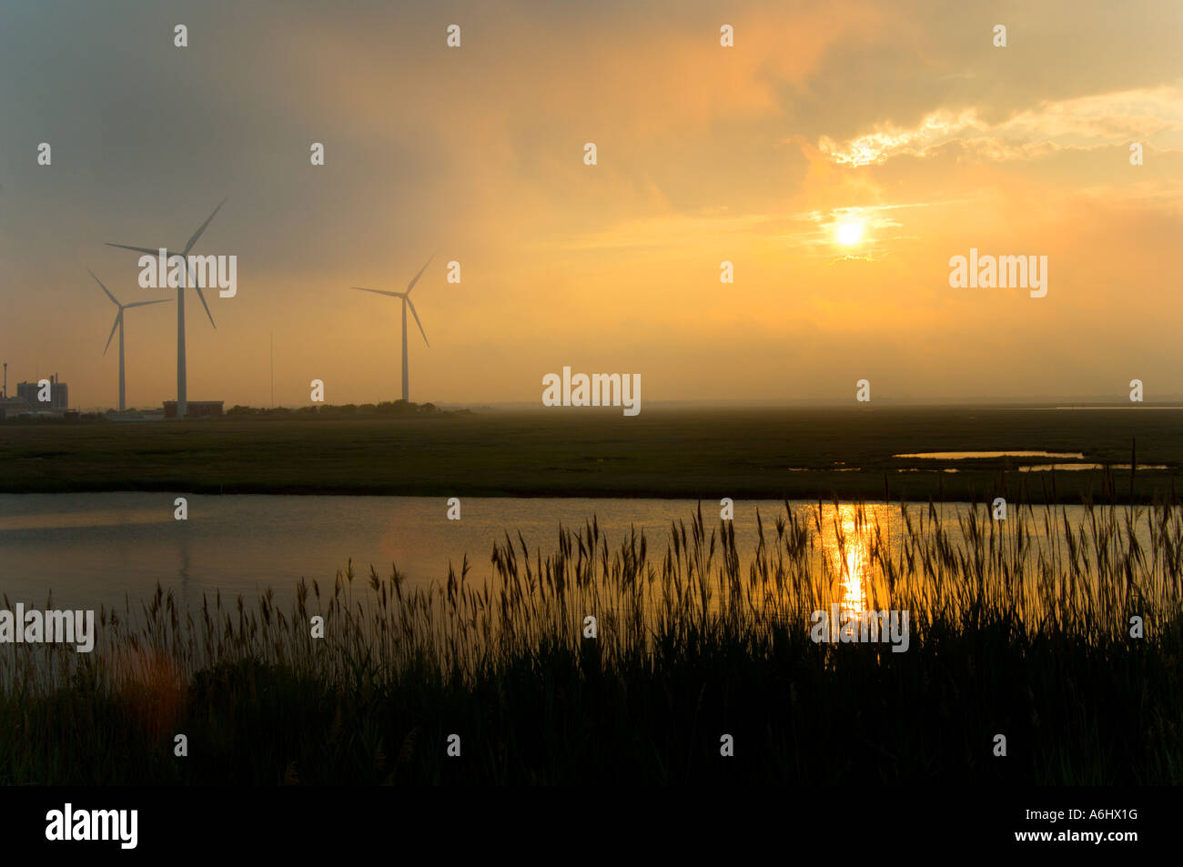 Windmills at Sunset Stock Photo - Alamy