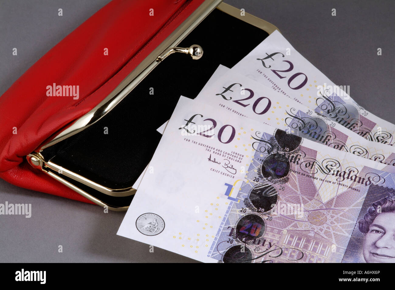 New twenty pound banknotes UK currency Red purse Stock Photo - Alamy
