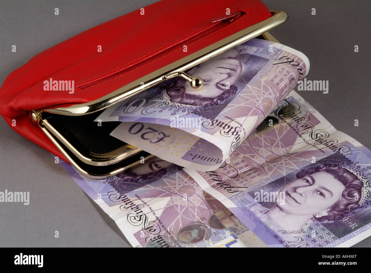 New twenty pound banknotes UK currency Red purse Stock Photo - Alamy