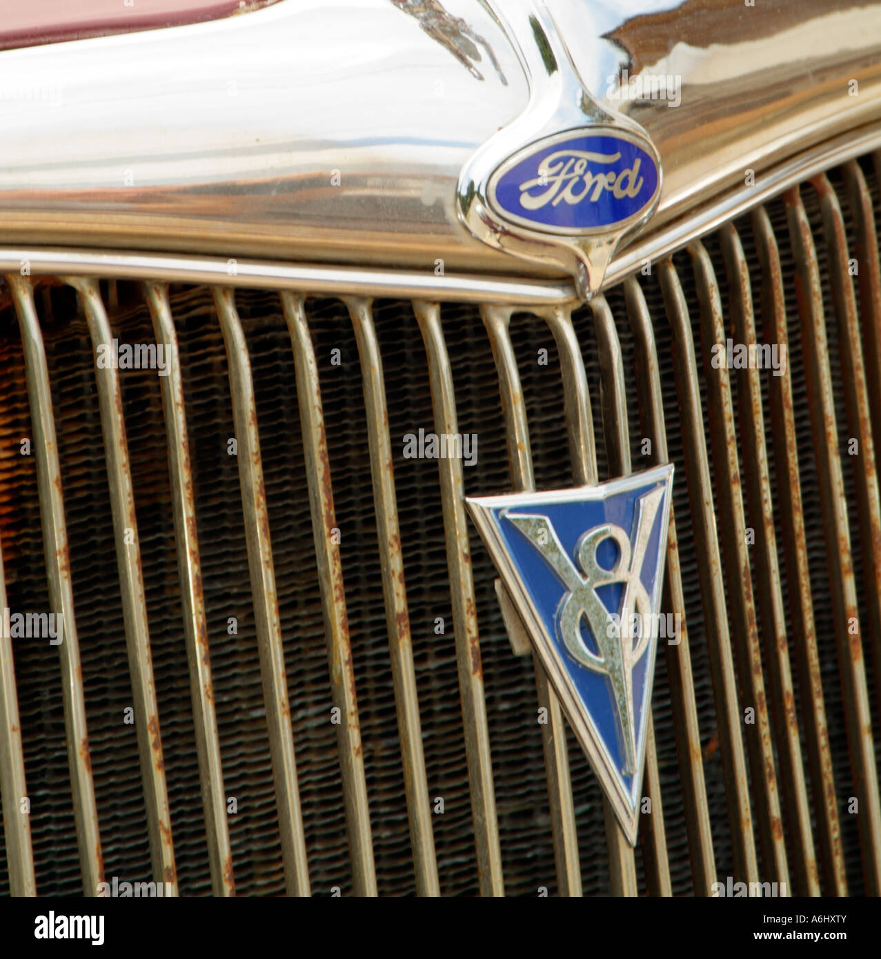 Vintage Ford V8 motor car radiator grill and badges Stock Photo - Alamy