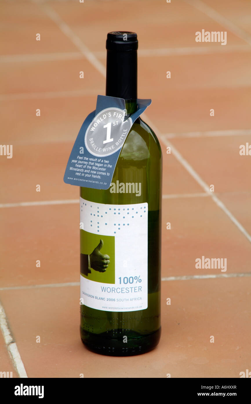 Reading Braille Raised writing on a wine bottle and label for use by ...