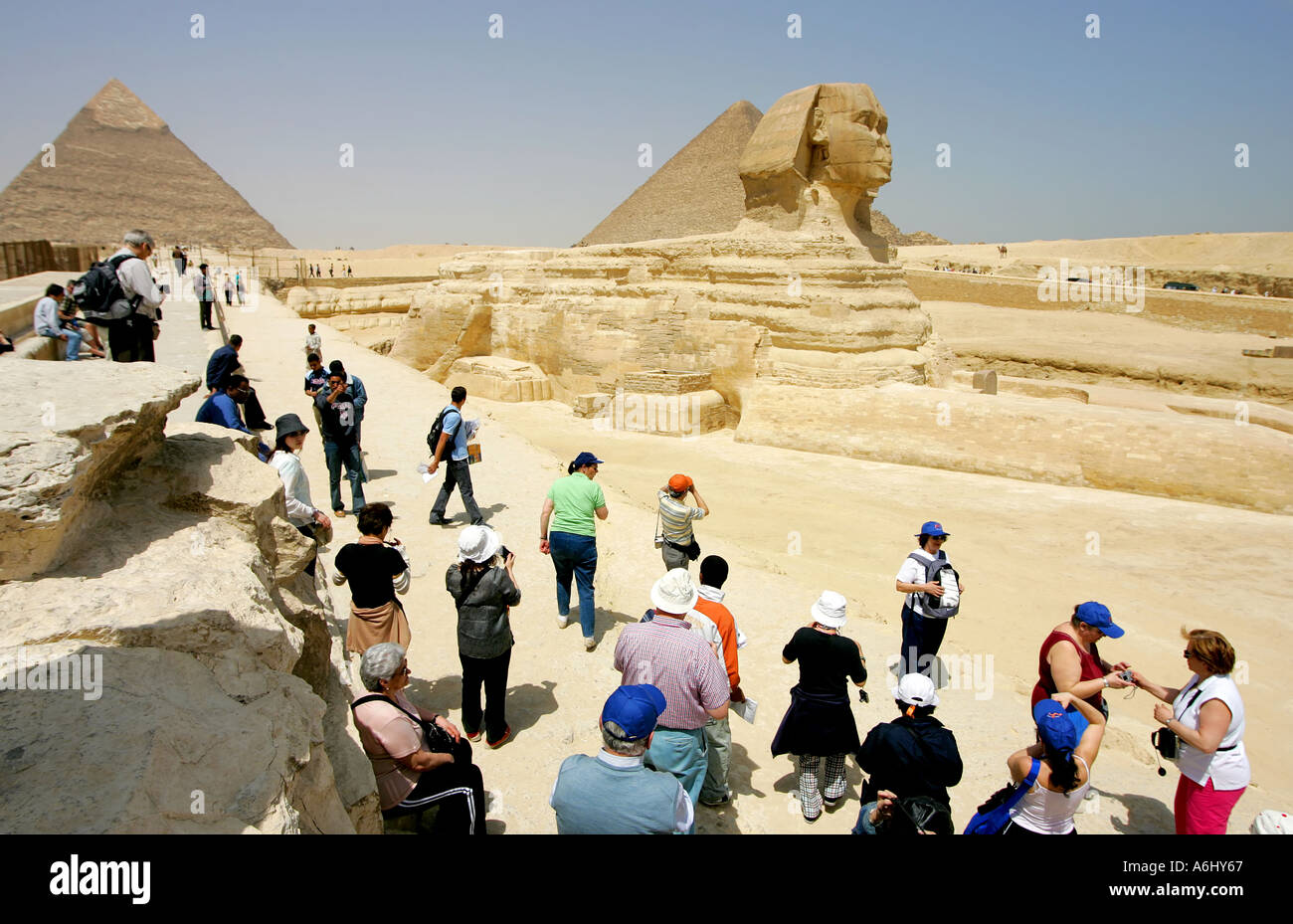 Tourists watching the pyramids at Giza Stock Photo - Alamy