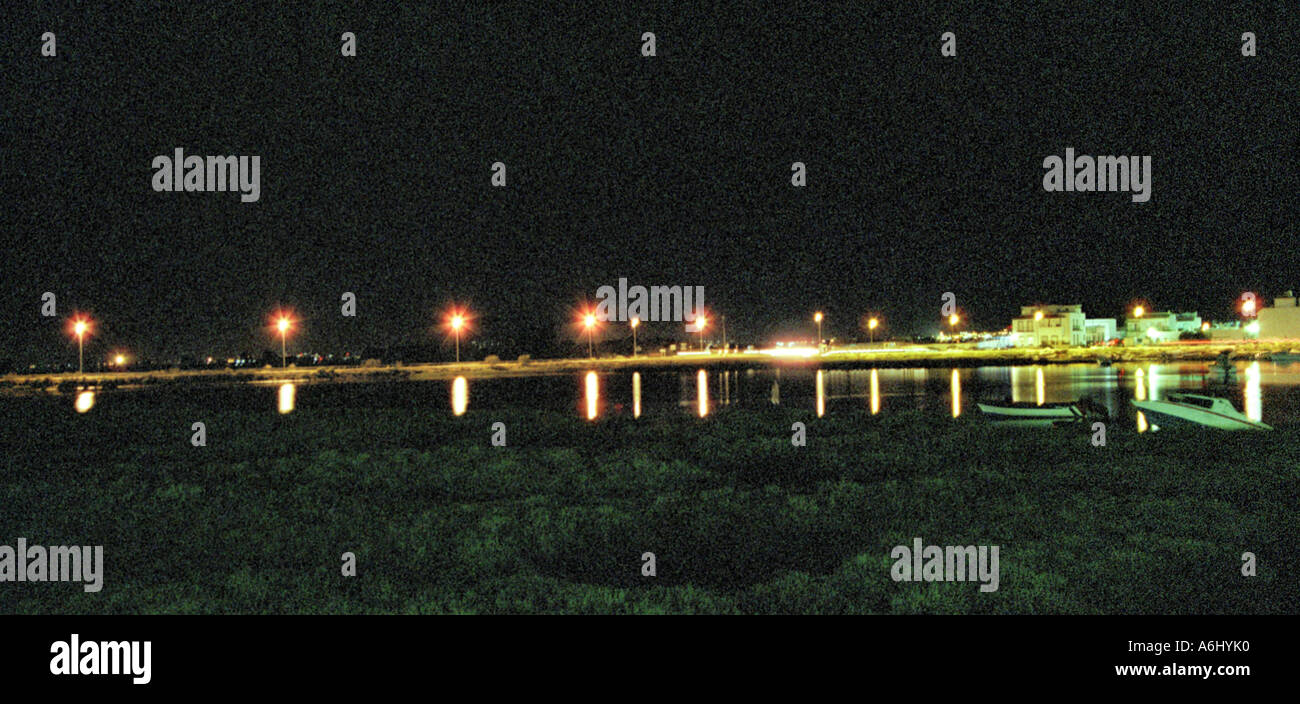 Night view of Isla Canela with harbour bridge Stock Photo - Alamy